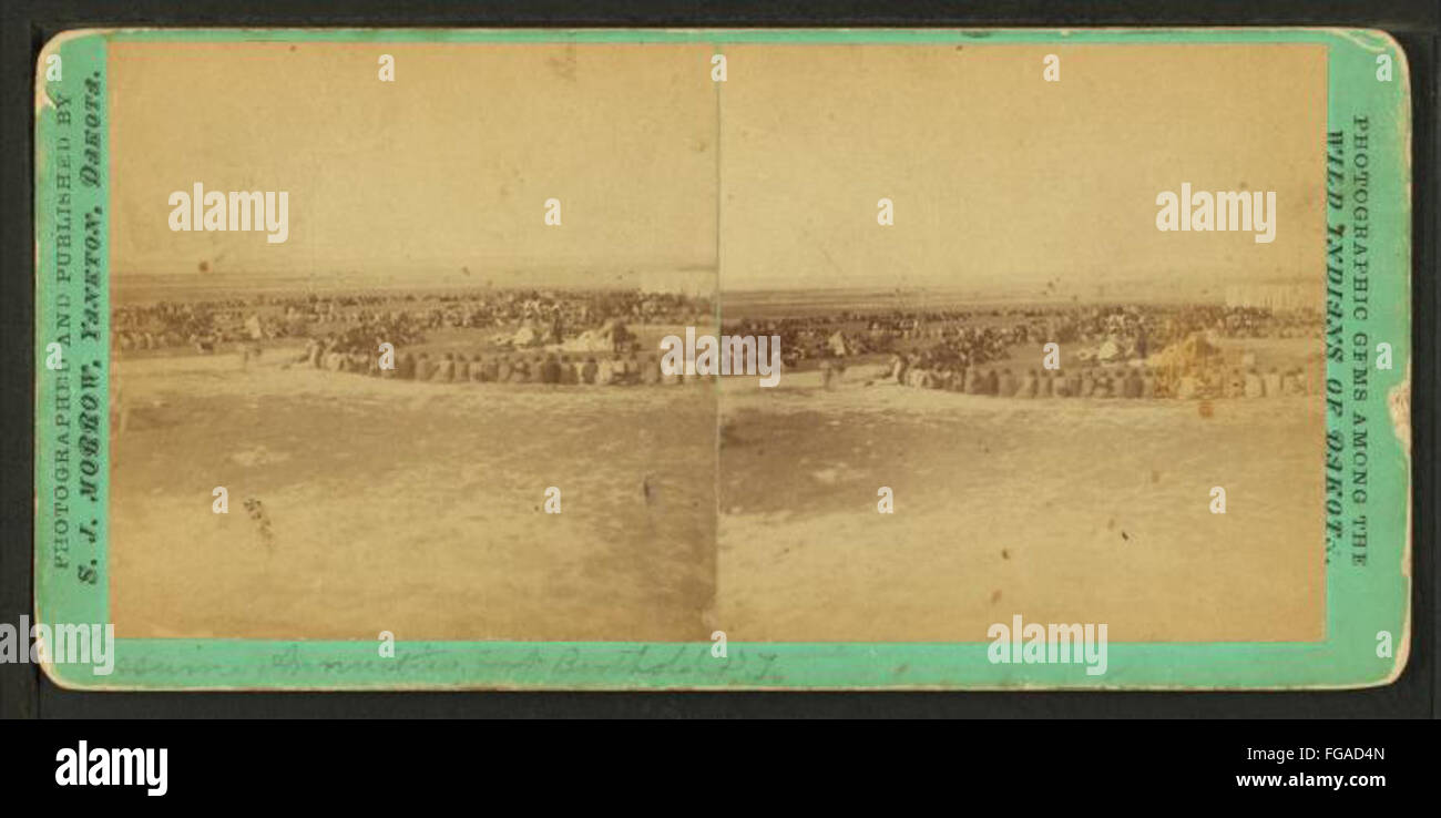 This photograph by Stanley J. Morrow depicts Native Americans gathered ...