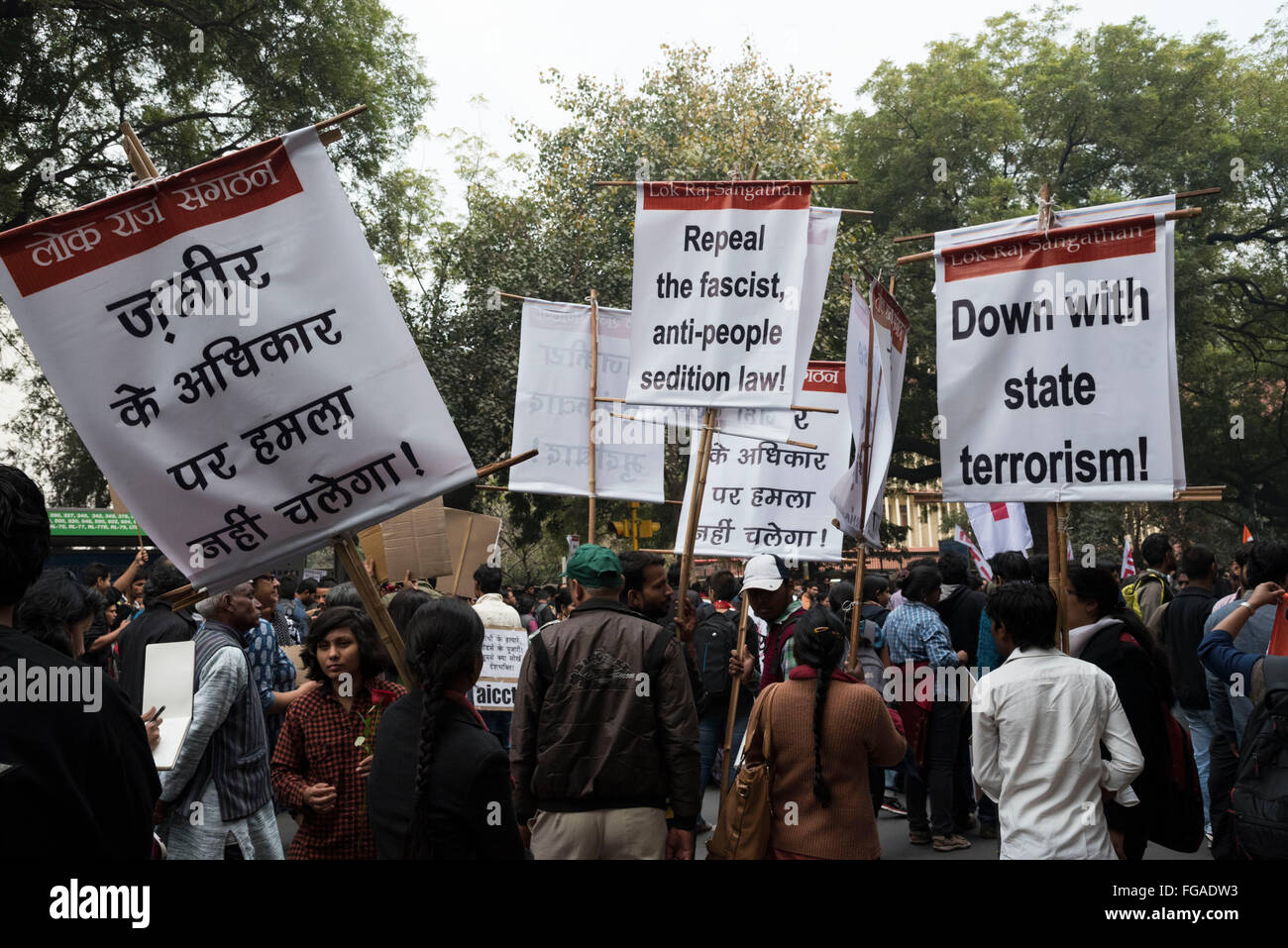 New Delhi, India. 18th Feb, 2016. People holding banner with photo of ...