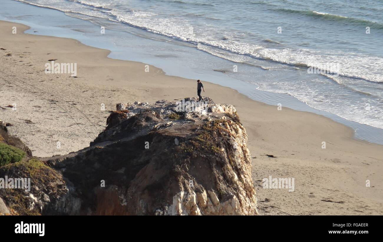Scenic View Of Cliff At Beach Stock Photo - Alamy