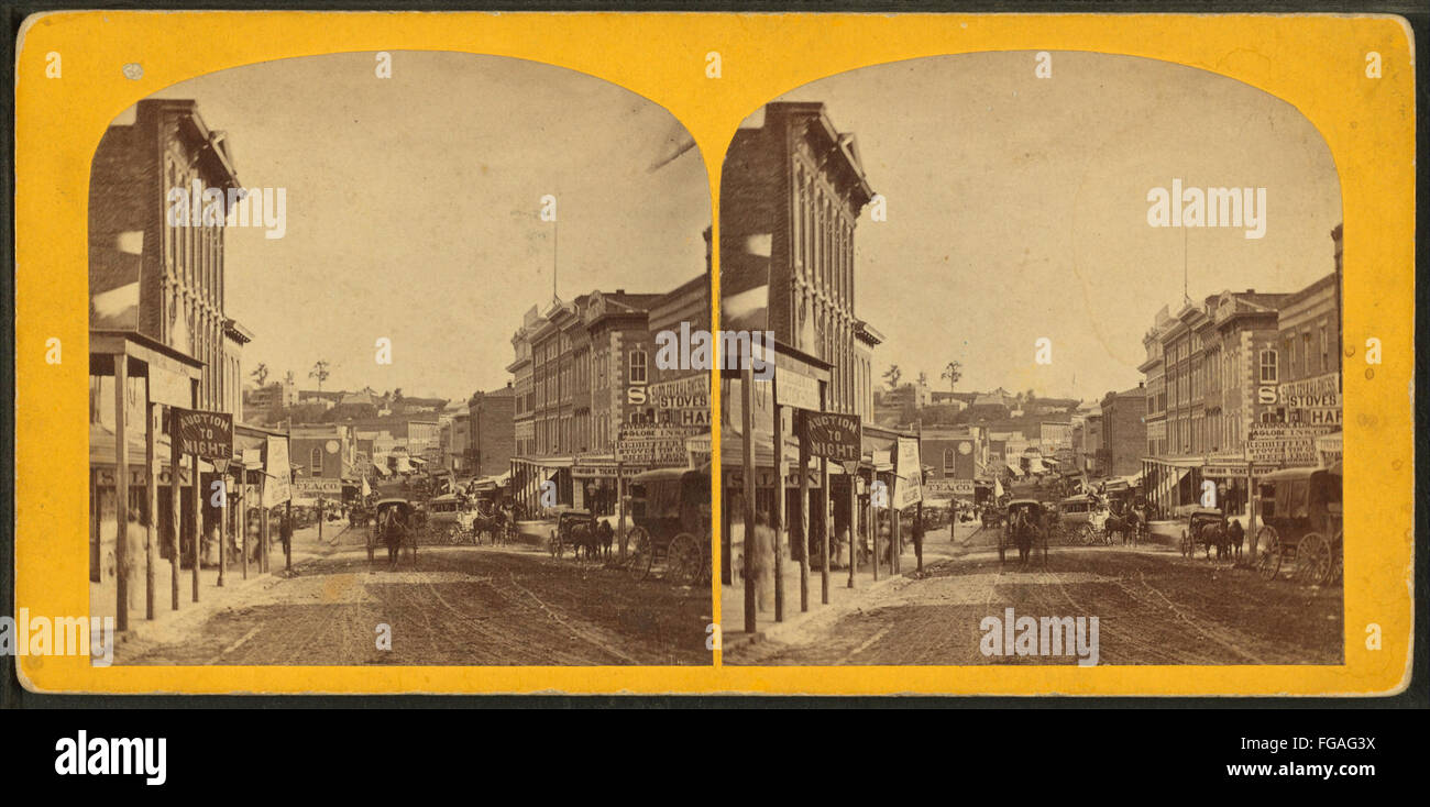 A photograph of Main Street from 3rd Street, showcasing a busy urban ...