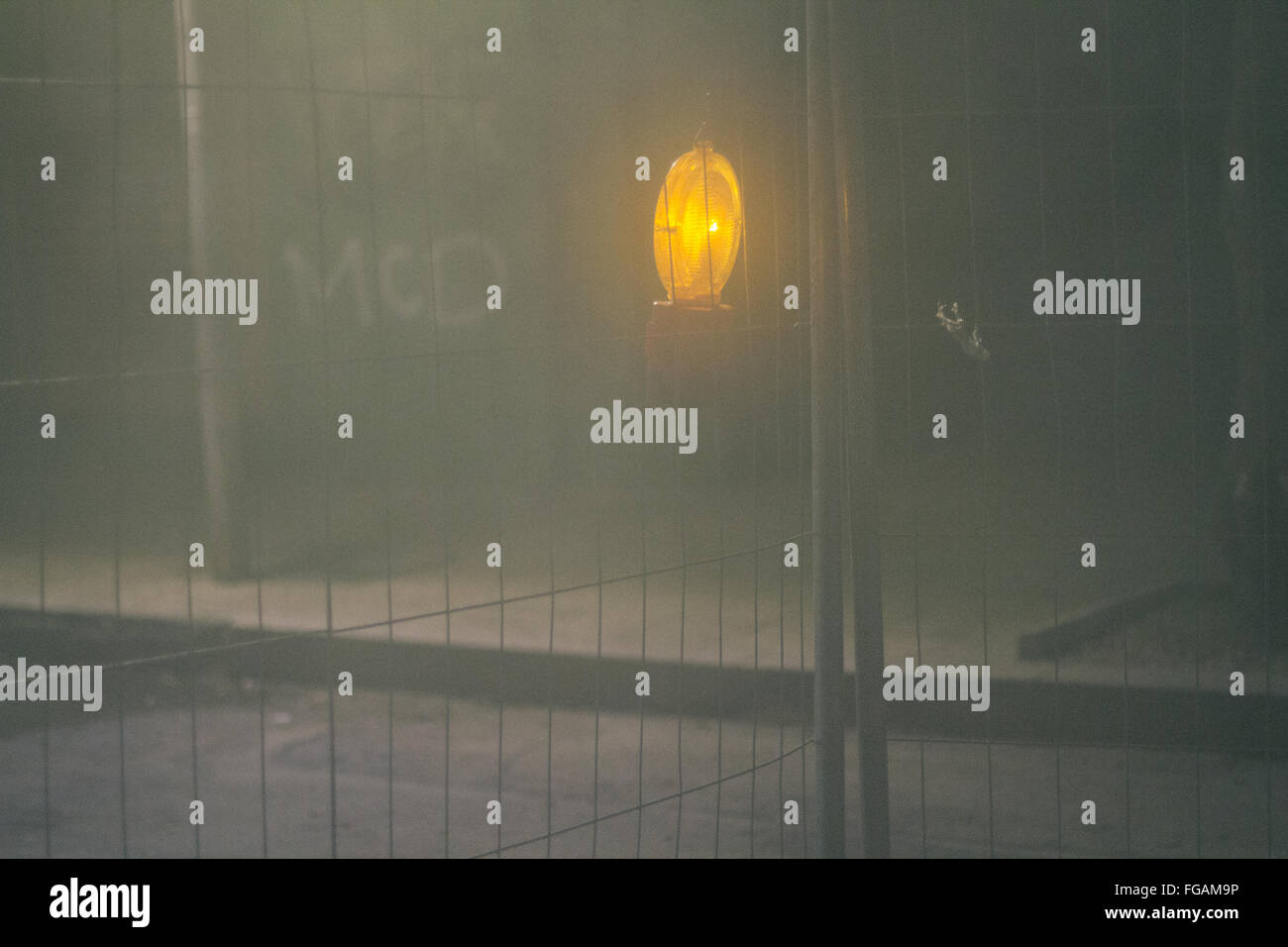 Illuminated Lighting Equipment Hanged On Metallic Gate Stock Photo - Alamy
