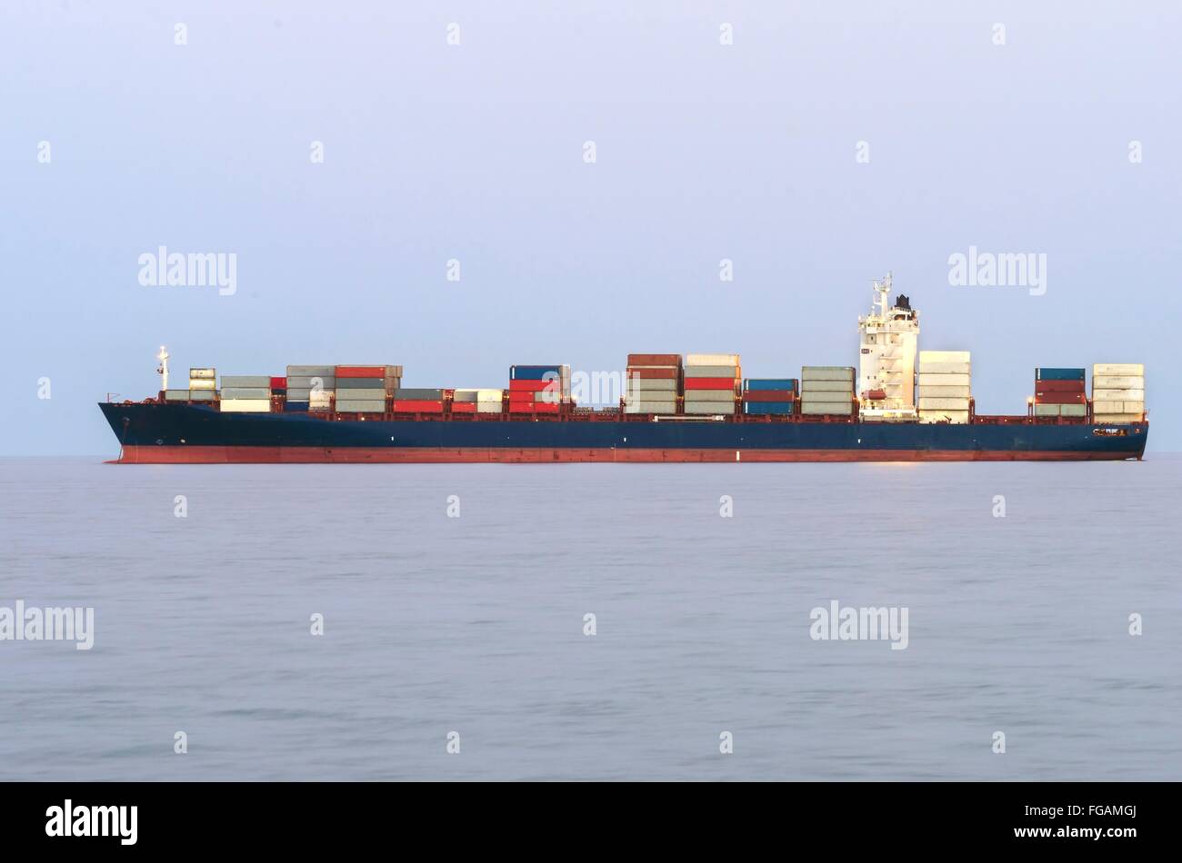 A view of a Cargo ship carrying a large number of containers for ...