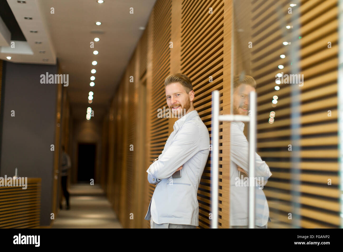 Modern young man in the office Stock Photo - Alamy