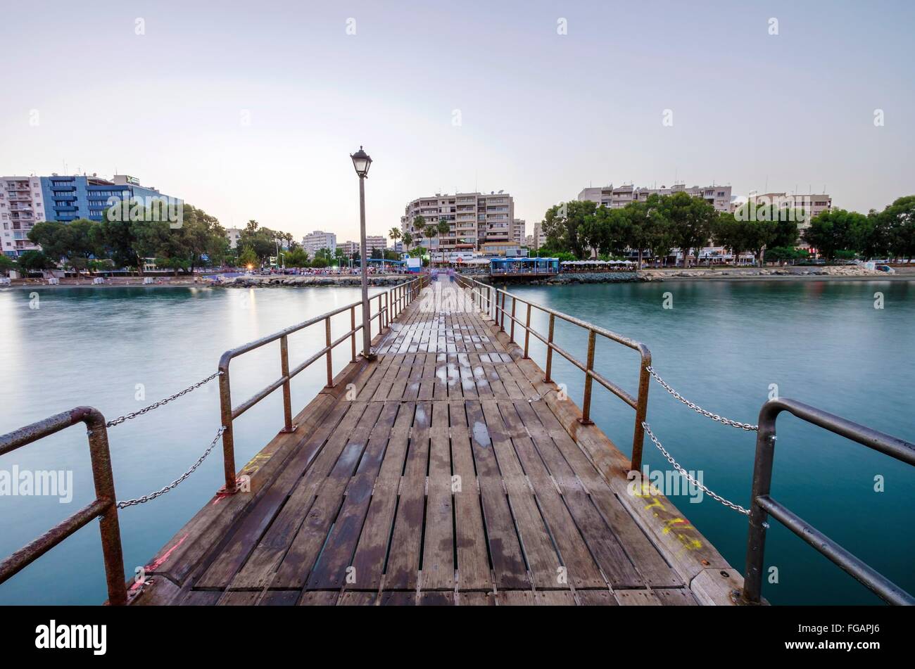 The Limassol pier in Enaerios Area in Cyprus and a view of the town ...