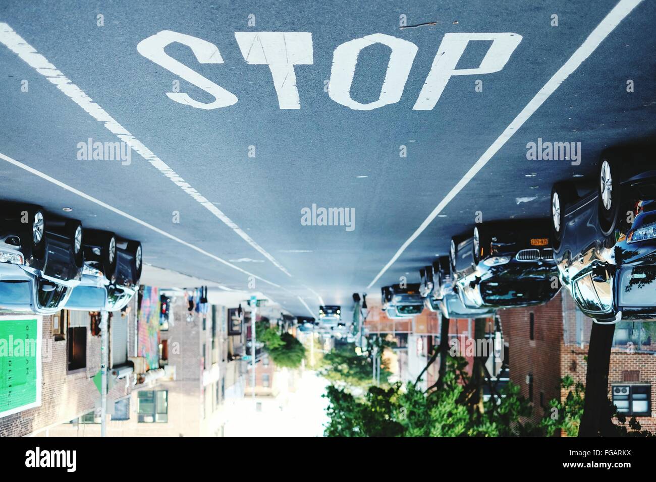 Upside Down Image Of Stop Sign On Road In City Stock Photo - Alamy