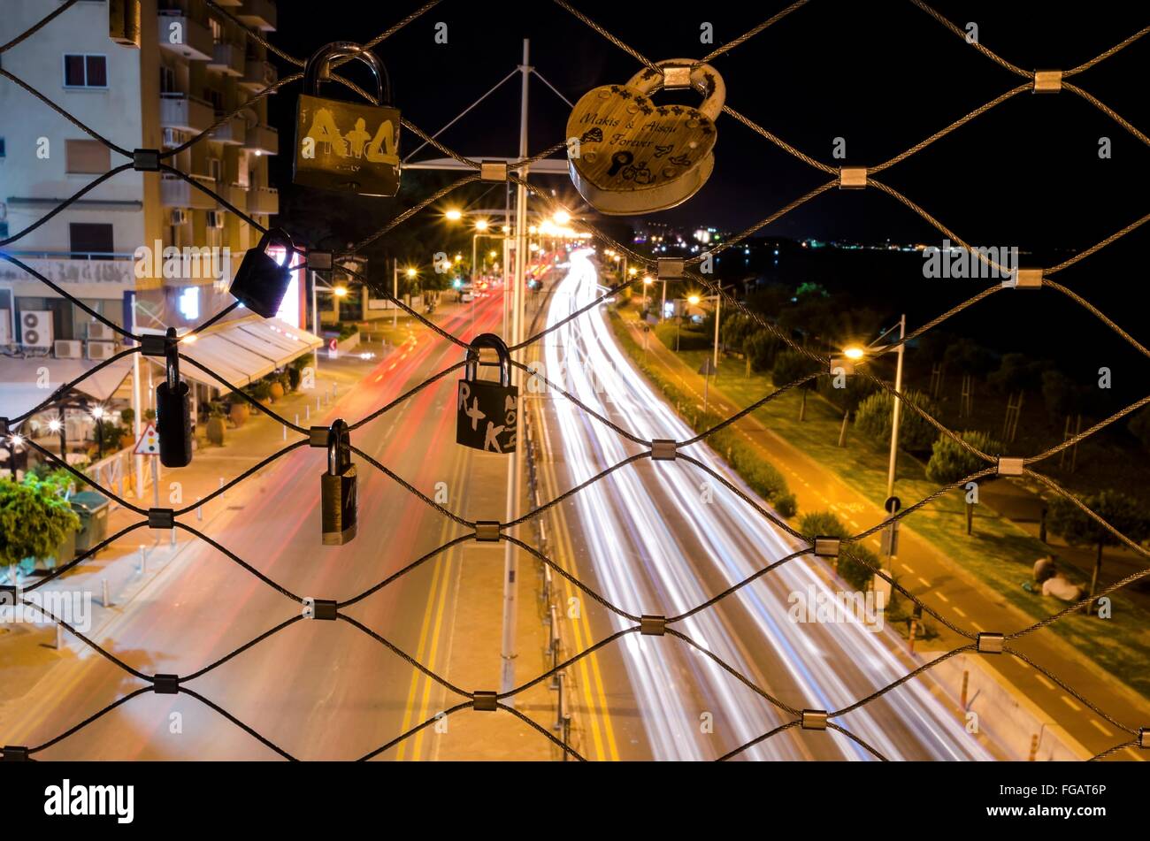 A night view of the seaside pedestrian bridge connecting the beach to ...