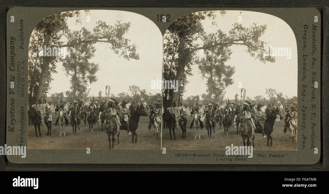 A photograph by the Keystone View Company showing Sioux Indians in full ...