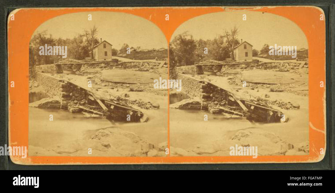 A photograph by Geo. H. Ireland & Co. showing the site of iron bridges ...