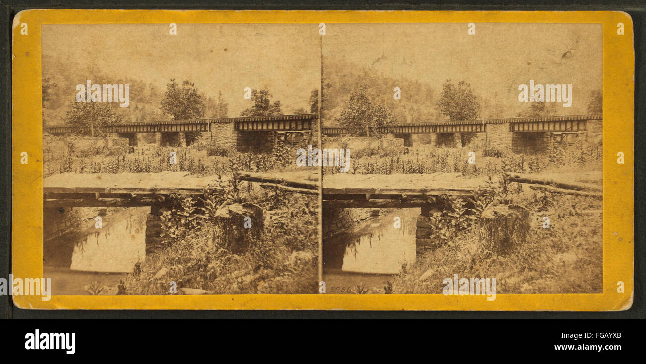 The iron bridge and the ruins of the old mill near Spruce Creek in ...