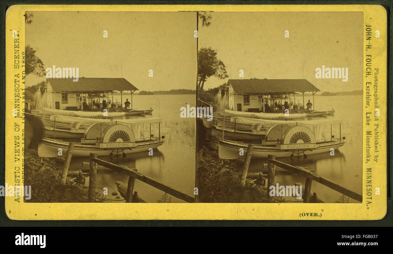 A photograph by John H. Fouch showing a blue line and boats. The image ...