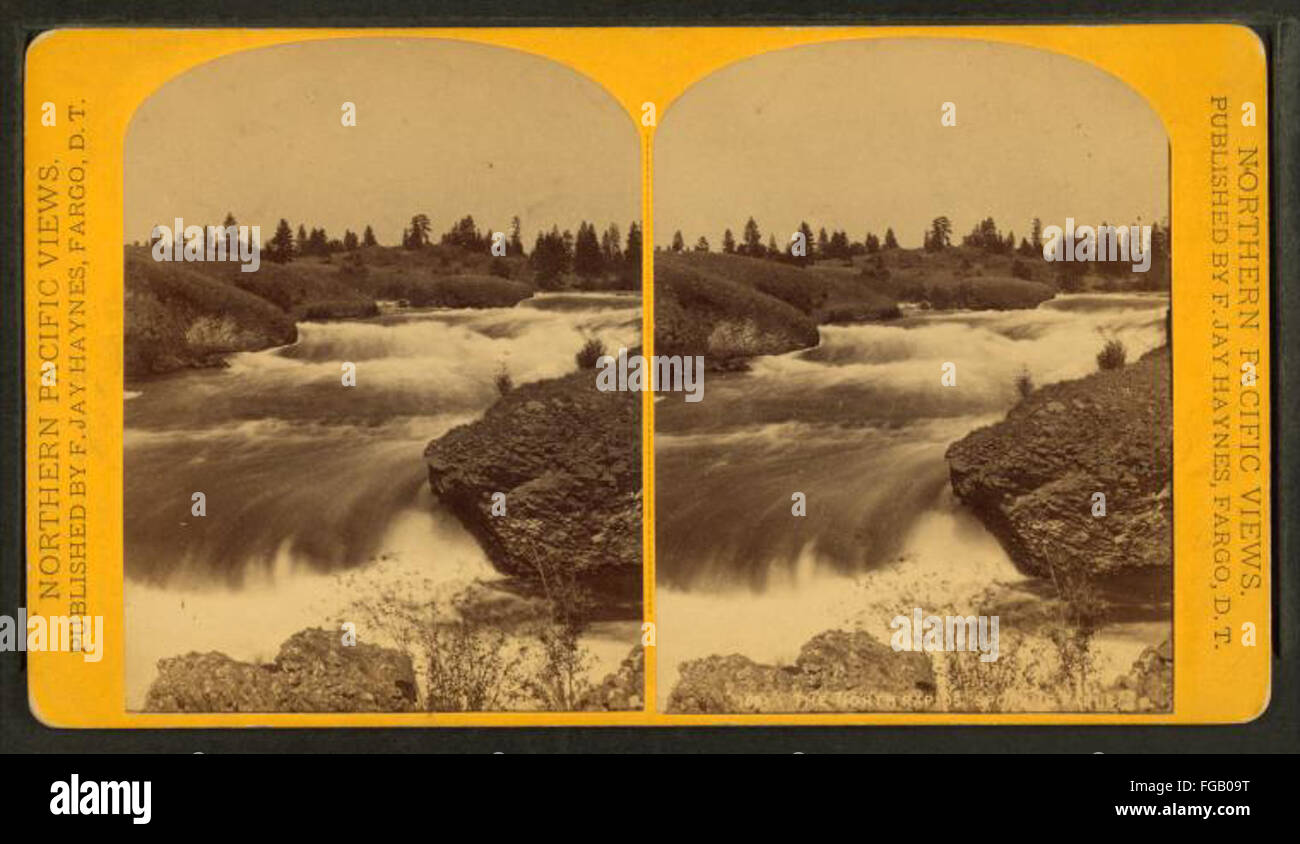 A photograph by F. Jay Haynes showing the north rapids of Spokane Falls, capturing the powerful ...