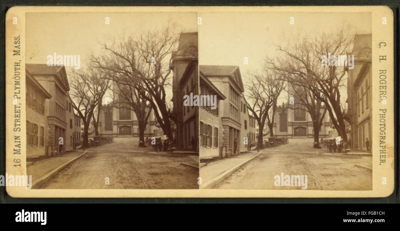 A photograph of a town square, captured by C. H. Rogers. The image ...
