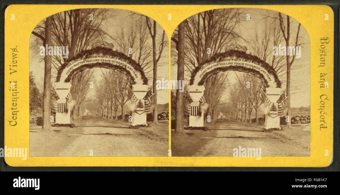 A photograph of a triumphal arch spanning the road leading to a ...