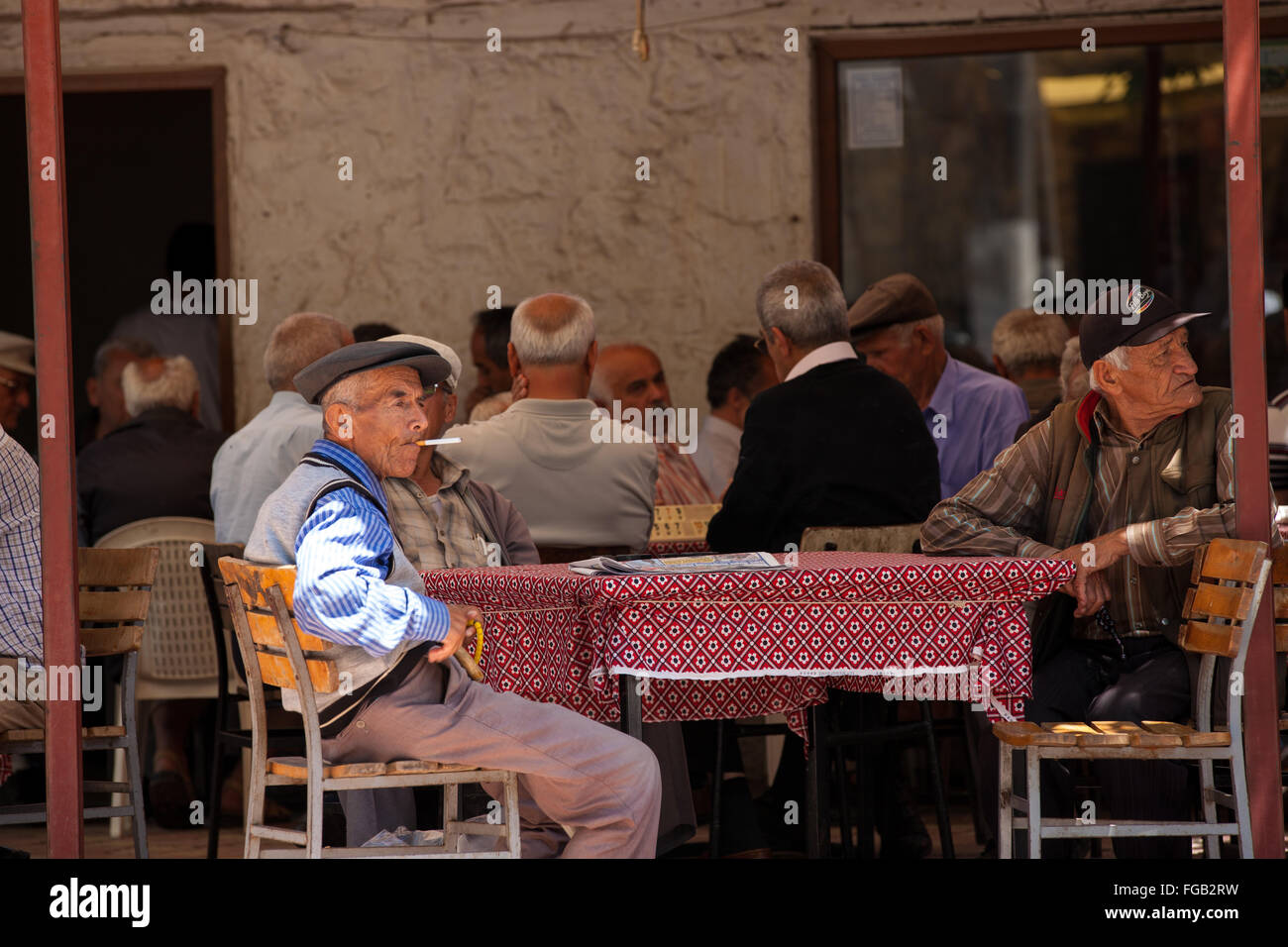 Local men sitting outside a cafe in Turkey Stock Photo - Alamy