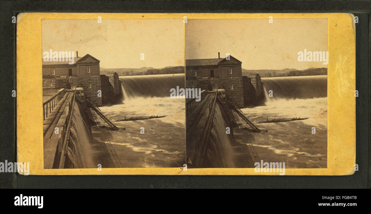 A photograph of a dam captured by A. E. Alden. The image shows the dam ...