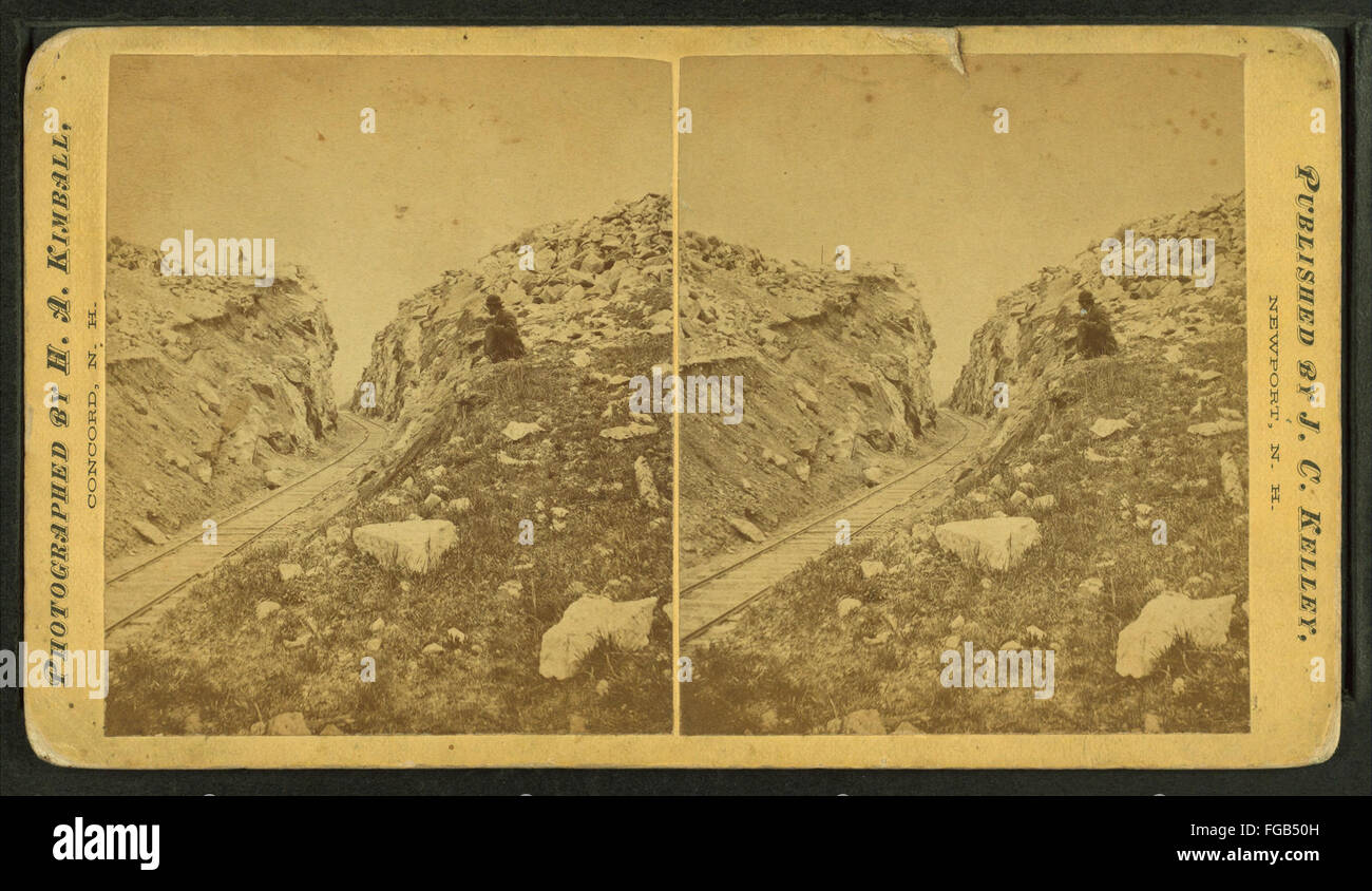 A photograph by J.C. Kelley showing a mountain railroad, focusing on ...