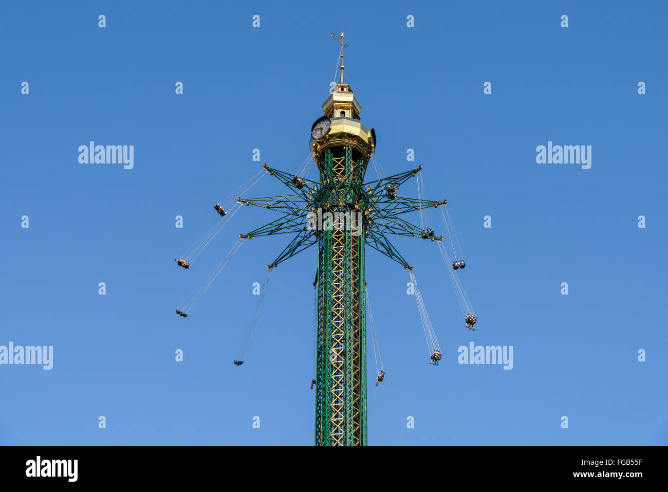 People Having Fun In Carousel Swing Ride At Amusement Park Stock Photo ...