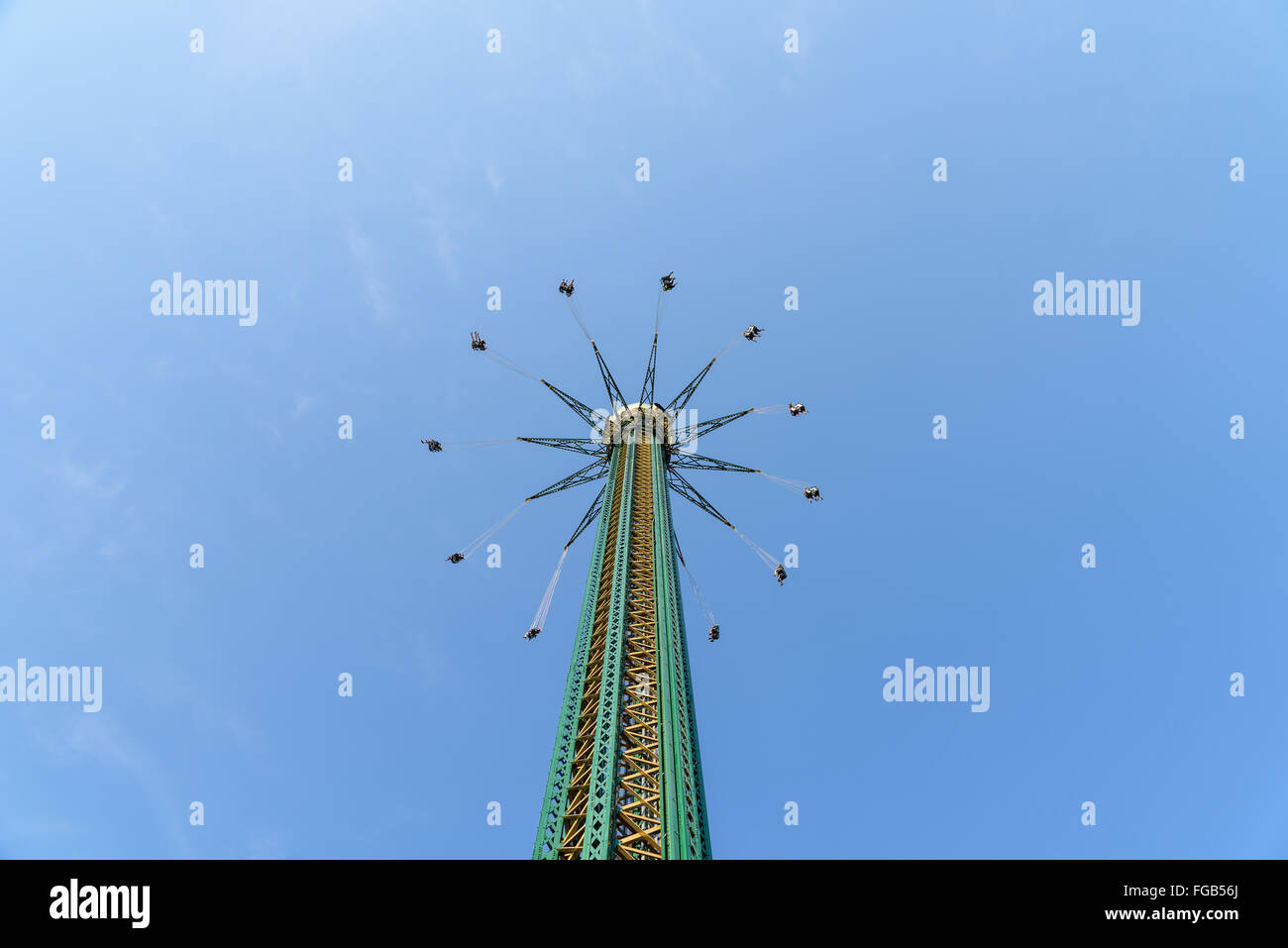 People Having Fun In Carousel Swing Ride At Amusement Park Stock Photo ...