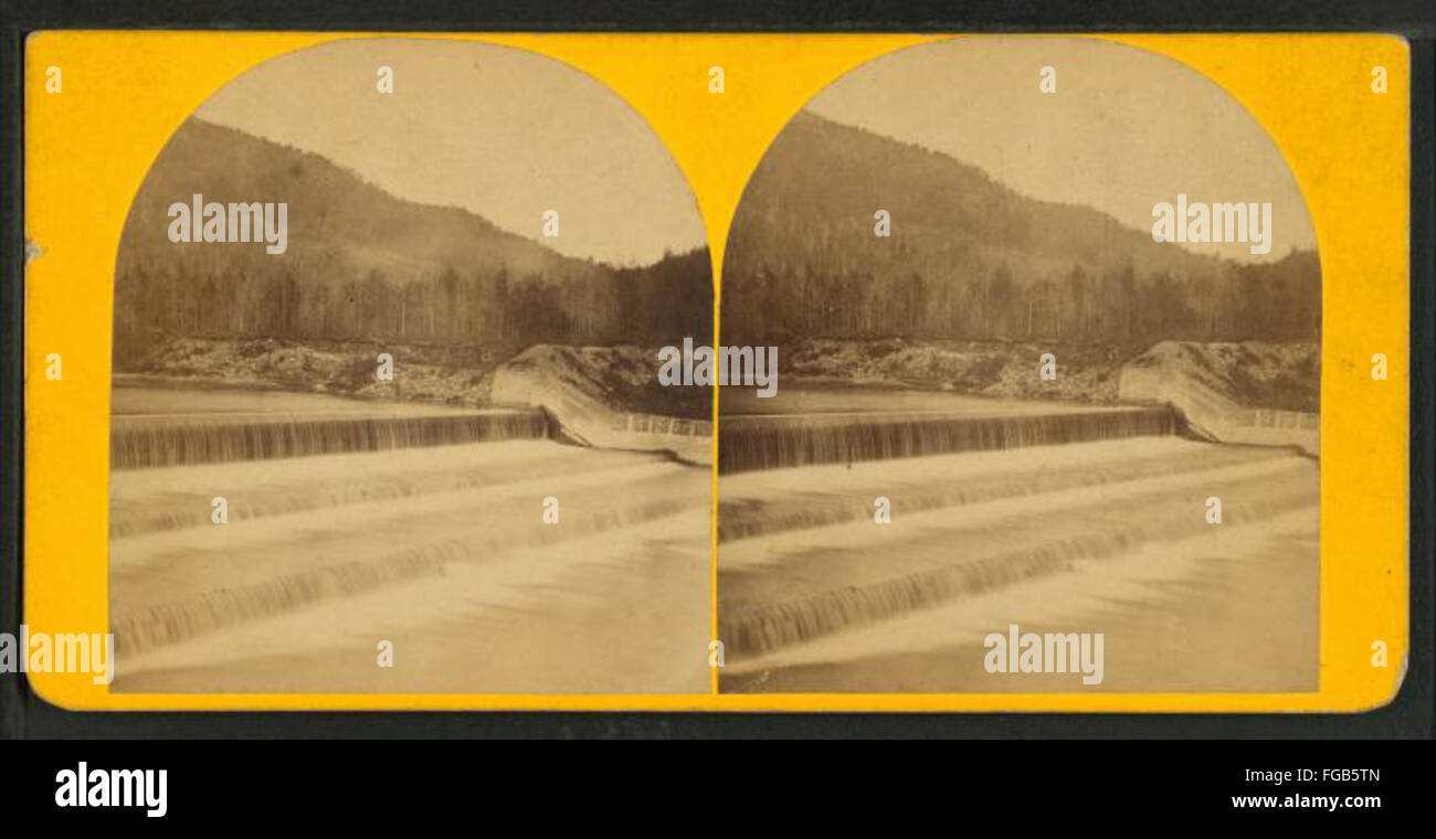 A photograph by George W. Moore showing a view of a dam, located 1-4 ...