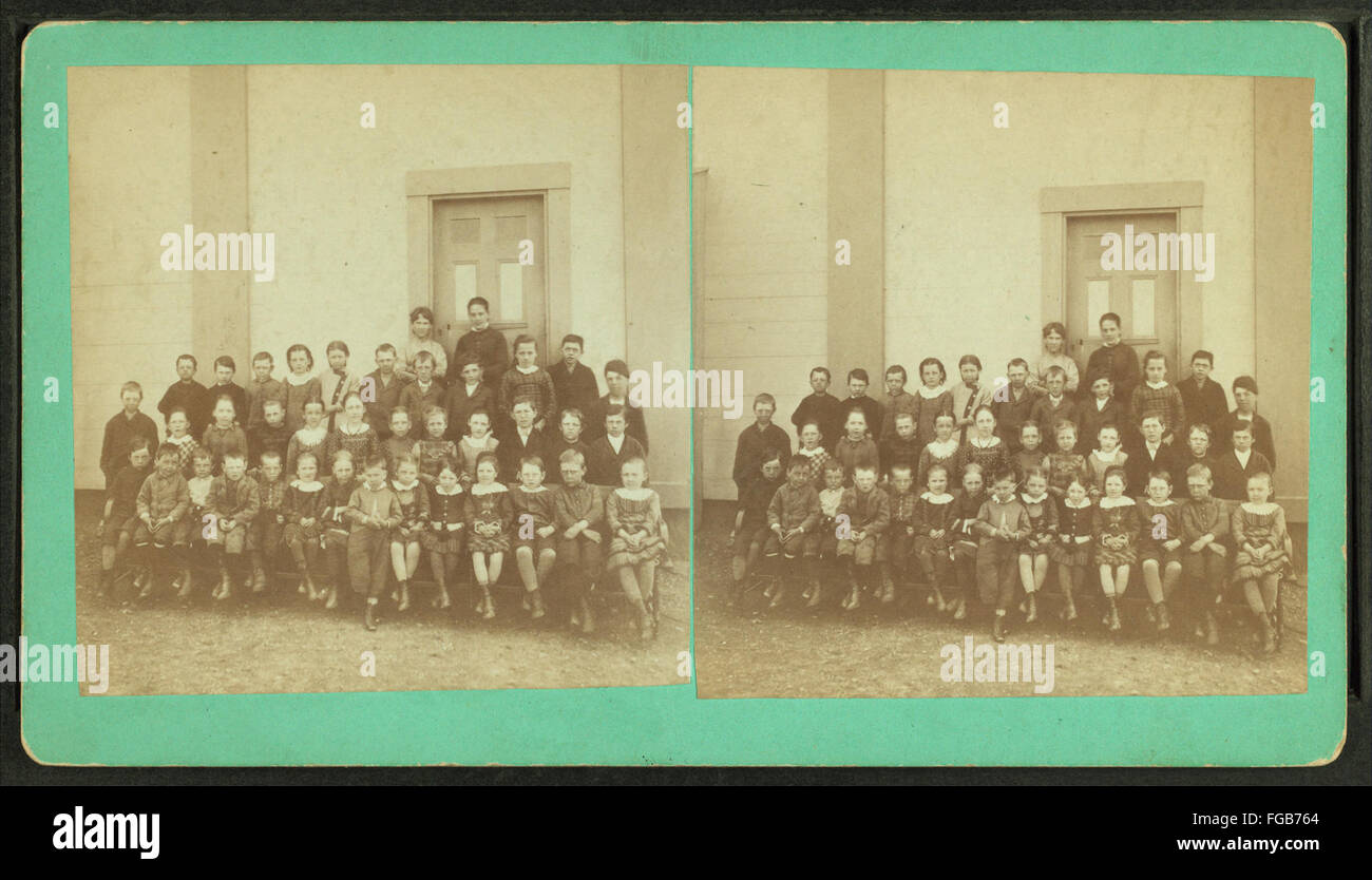 A photograph featuring an unidentified group of students and teachers ...