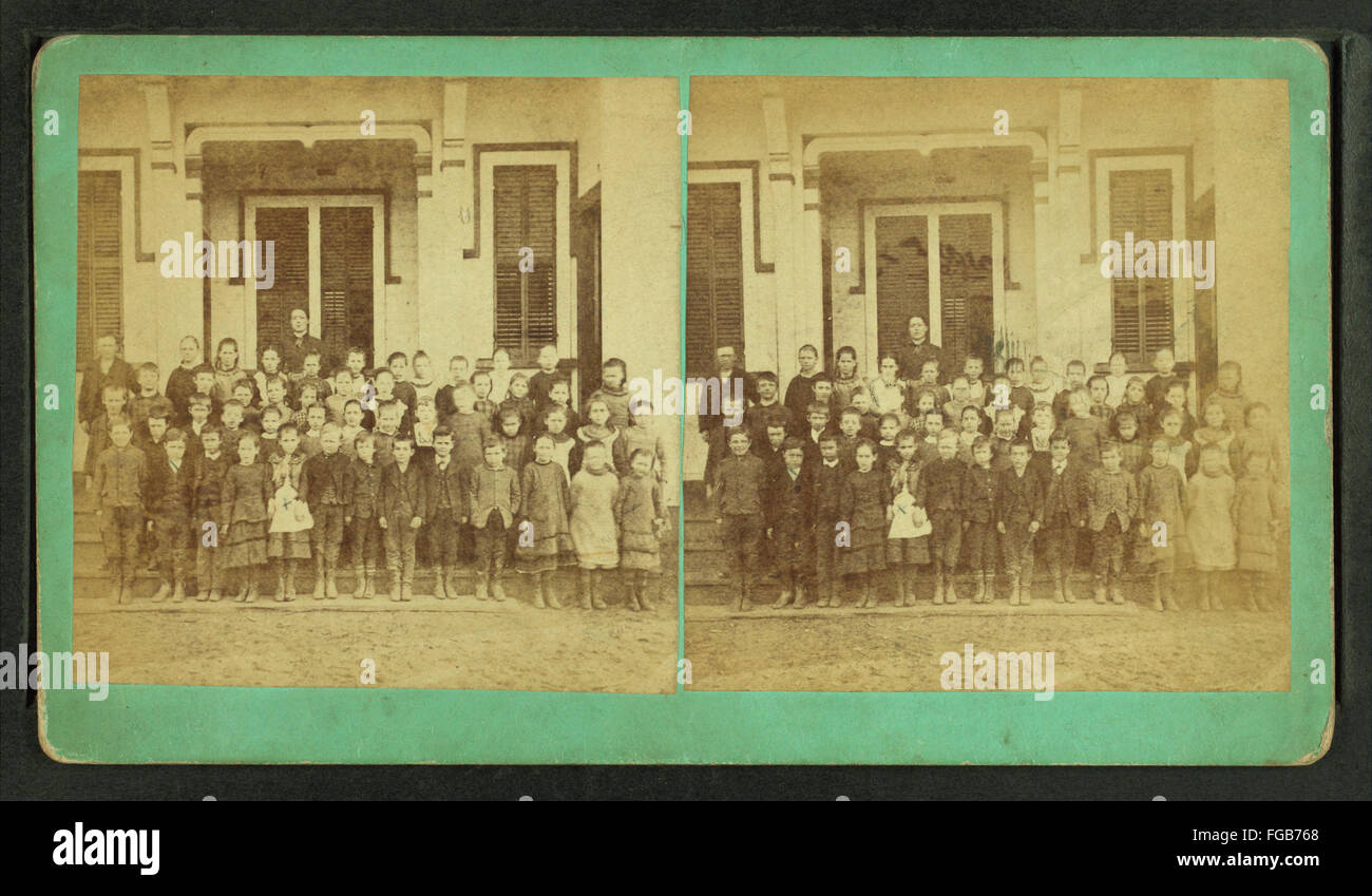 A photograph depicting unidentified students and teachers, capturing a ...