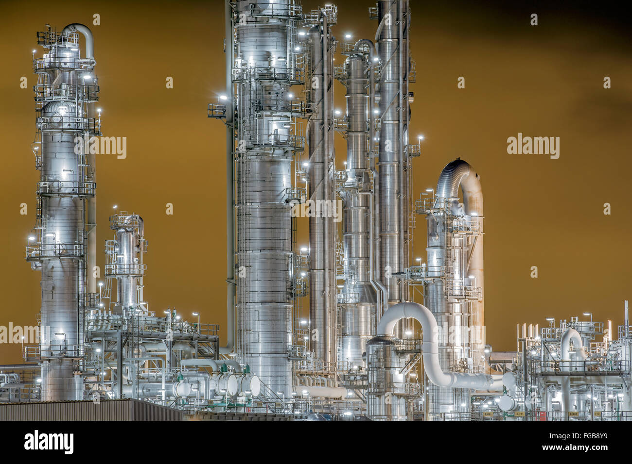 Refinery installation at night Stock Photo - Alamy