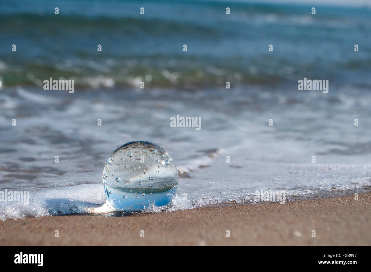 Glass sphere beach hi-res stock photography and images - Alamy