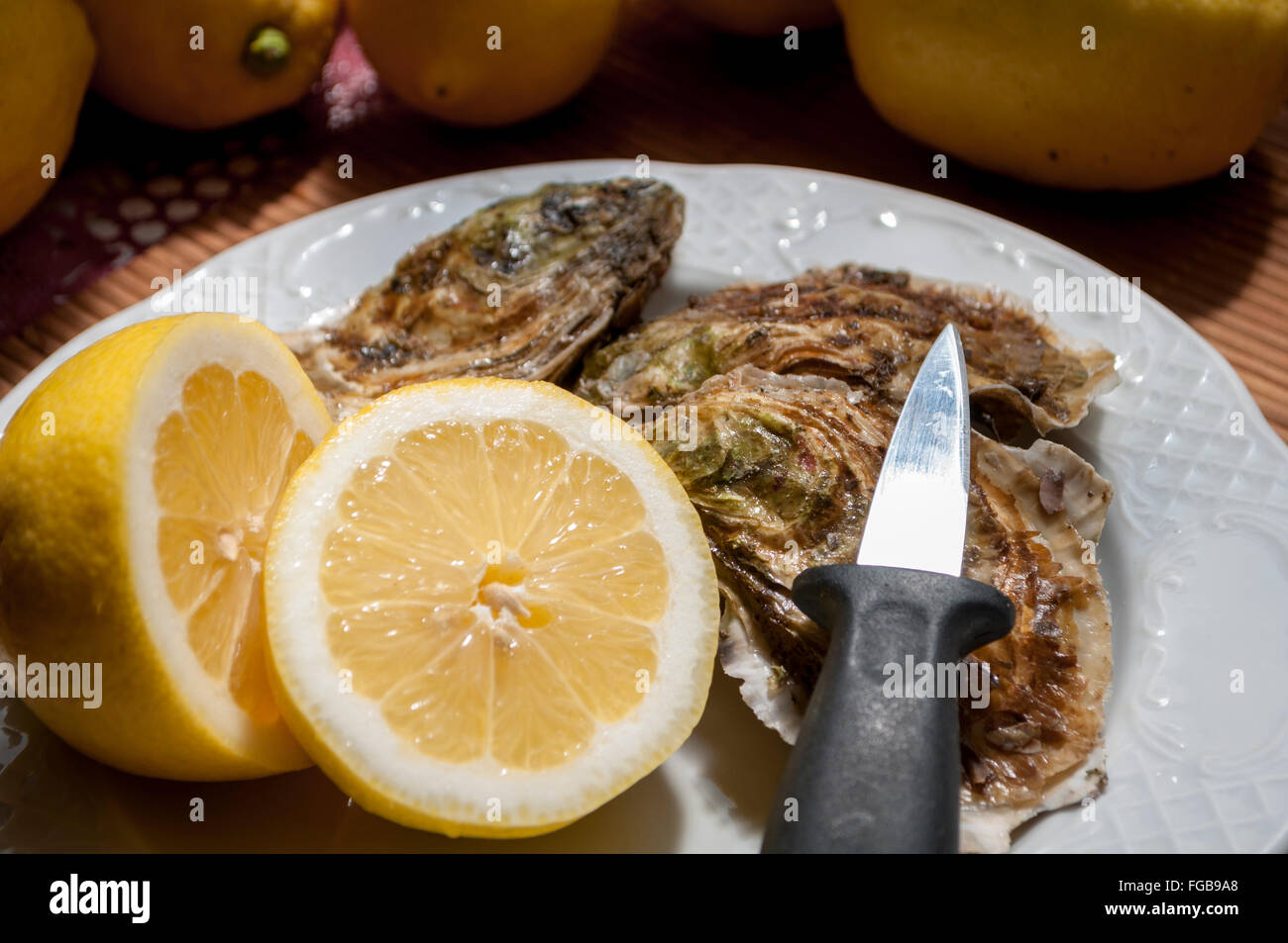 preparation of shellfish for consumption,open it, on the background of ...