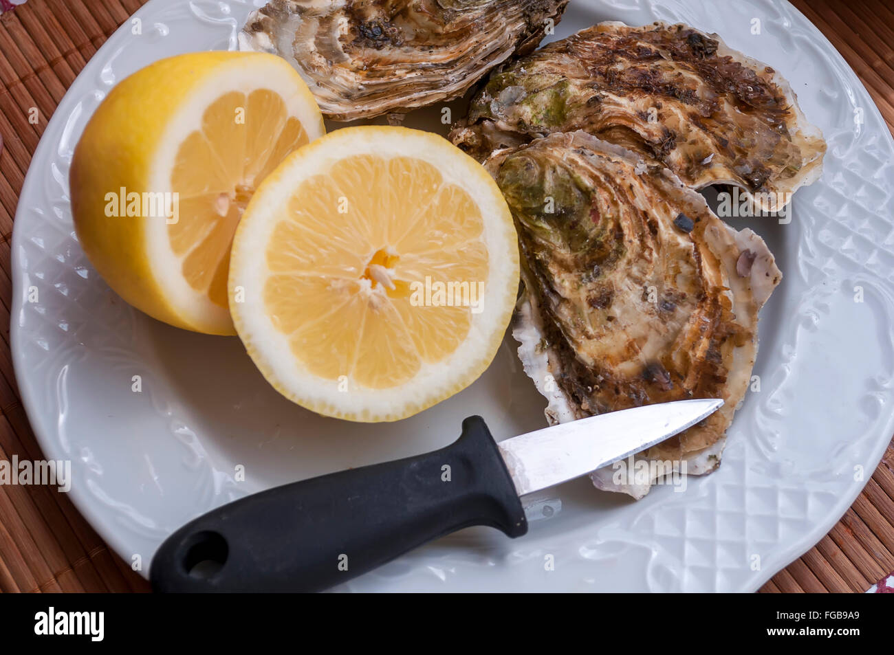 preparation of shellfish for consumption,open it, on the background of ...