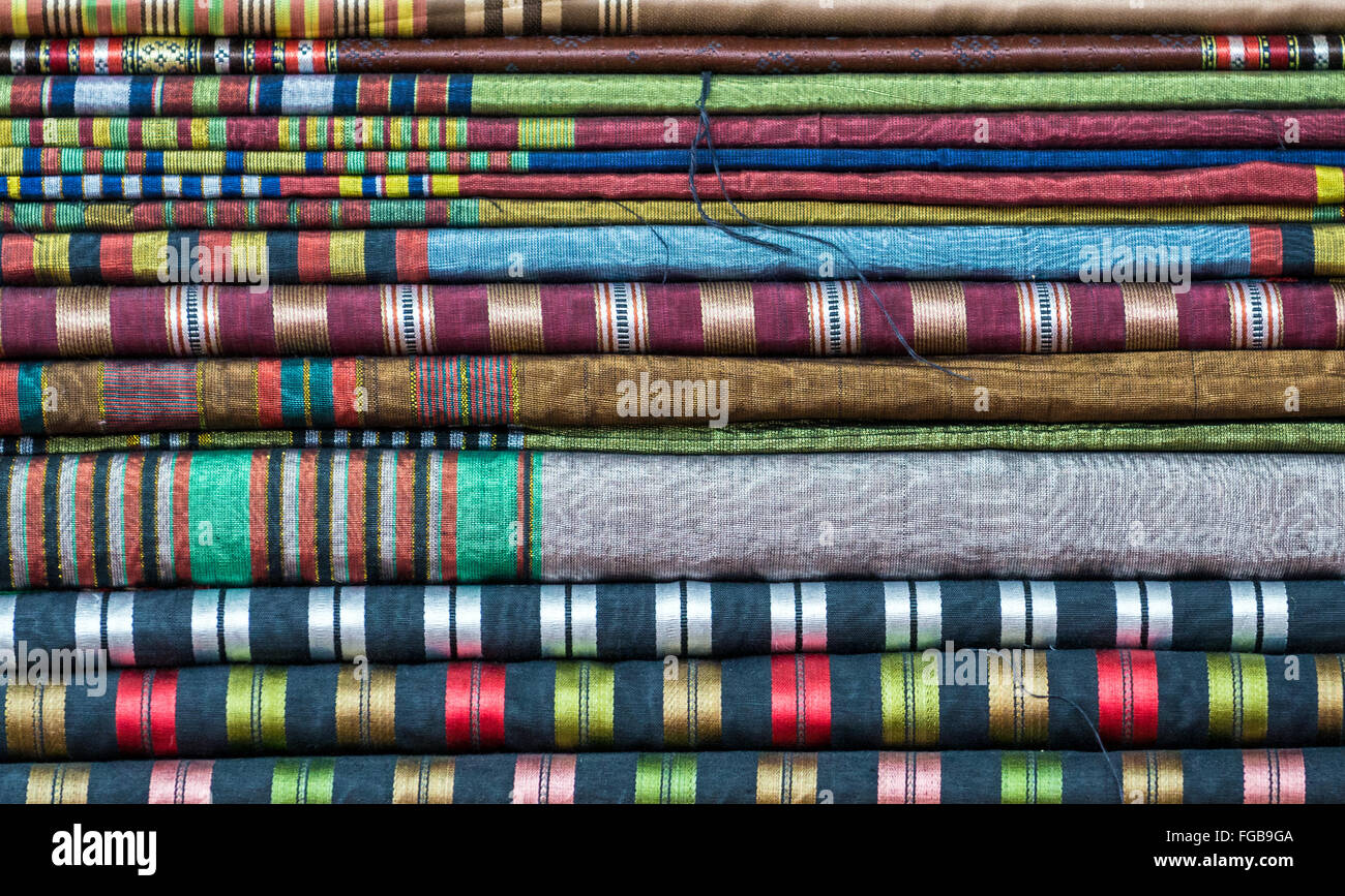 heap of oriental textiles in draper's shop at arabian market in ...