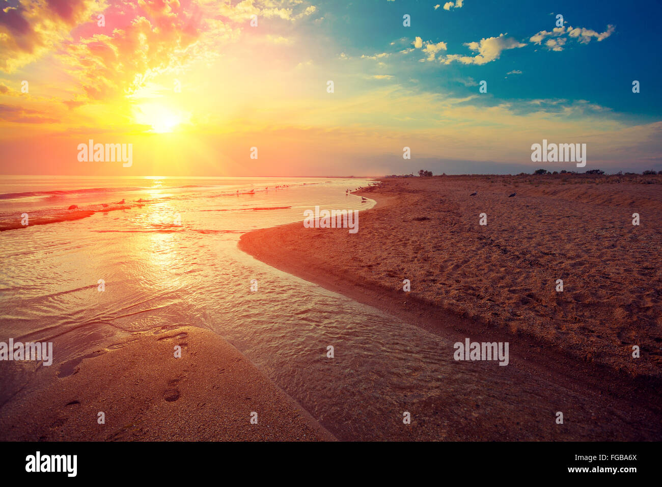 Sunrise over sea Stock Photo - Alamy