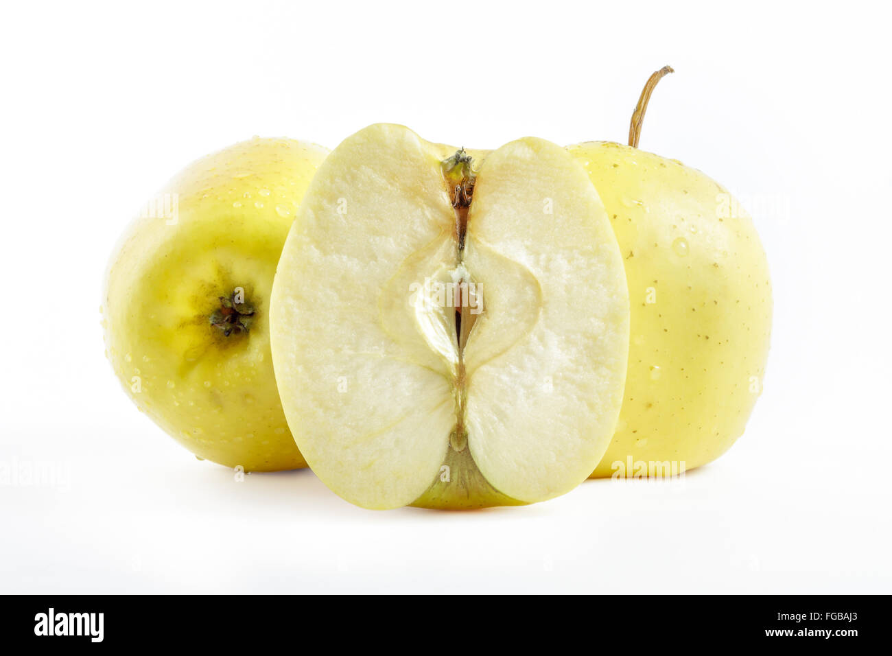 Golden delicious apples isolated on white background Stock Photo - Alamy