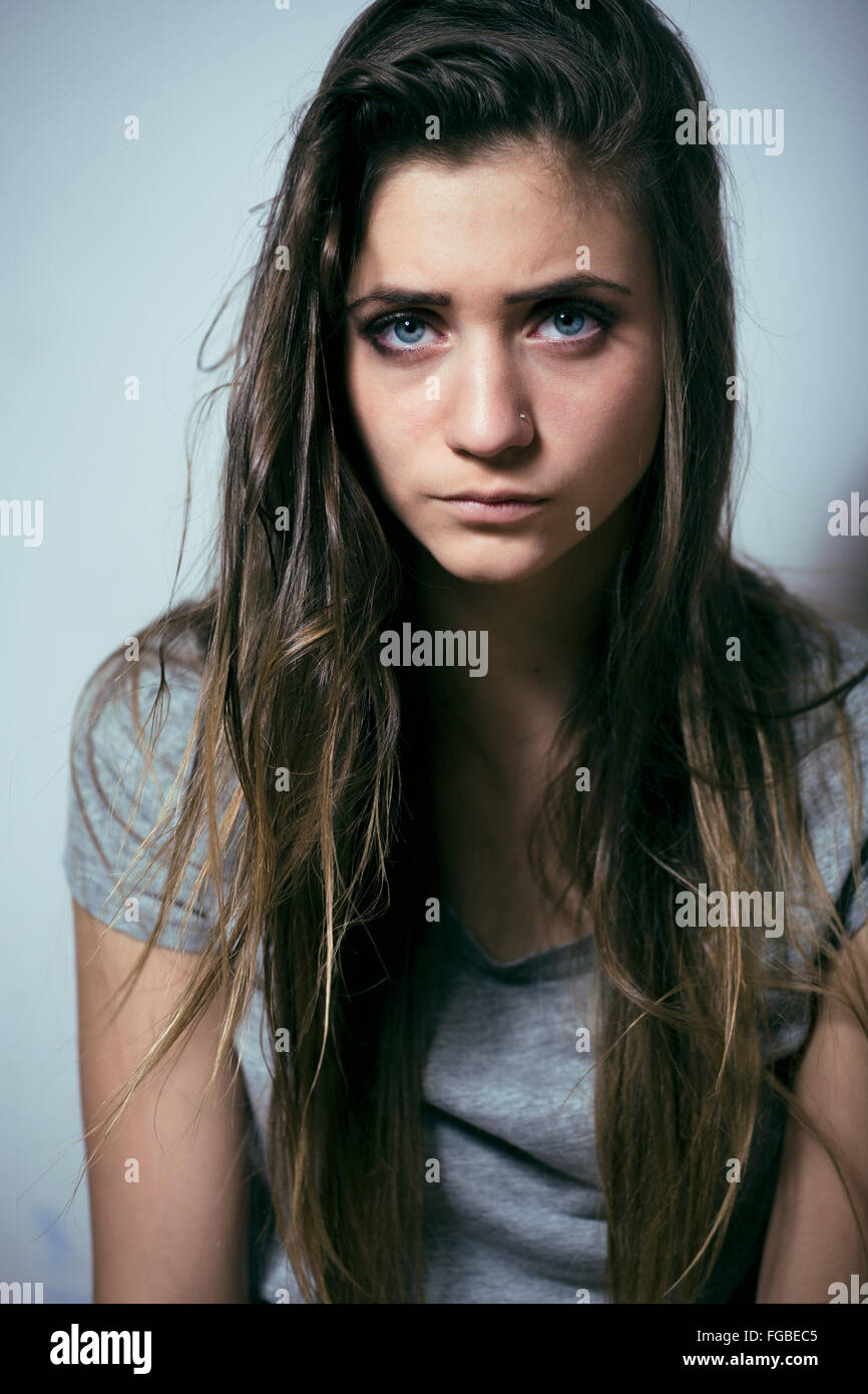 problem depressioned teenage with messed hair and sad face, real junky ...