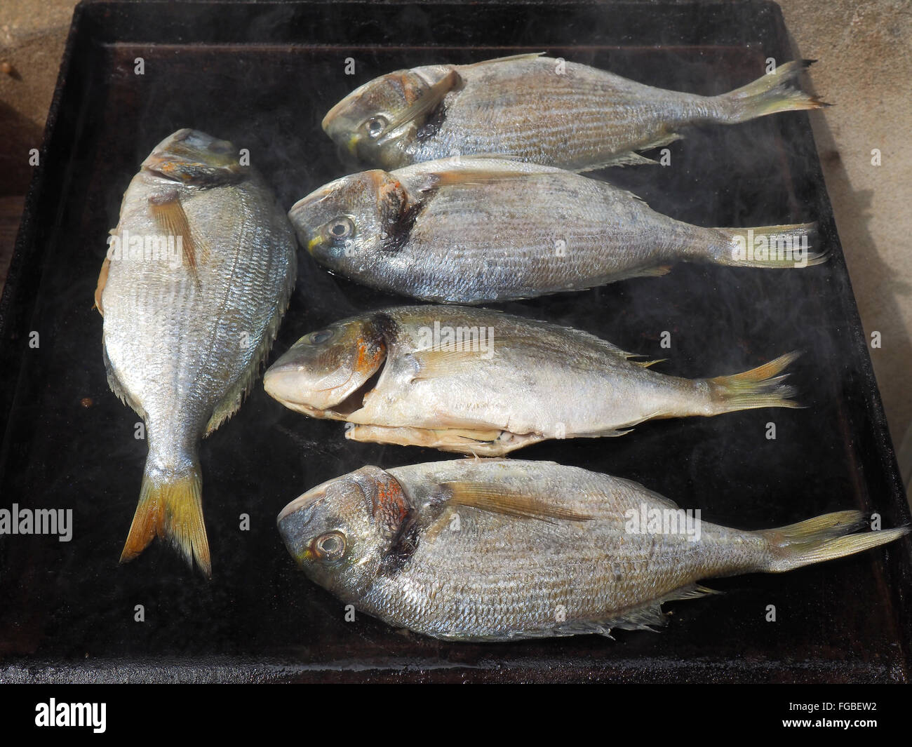 Being grilled hi-res stock photography and images - Alamy