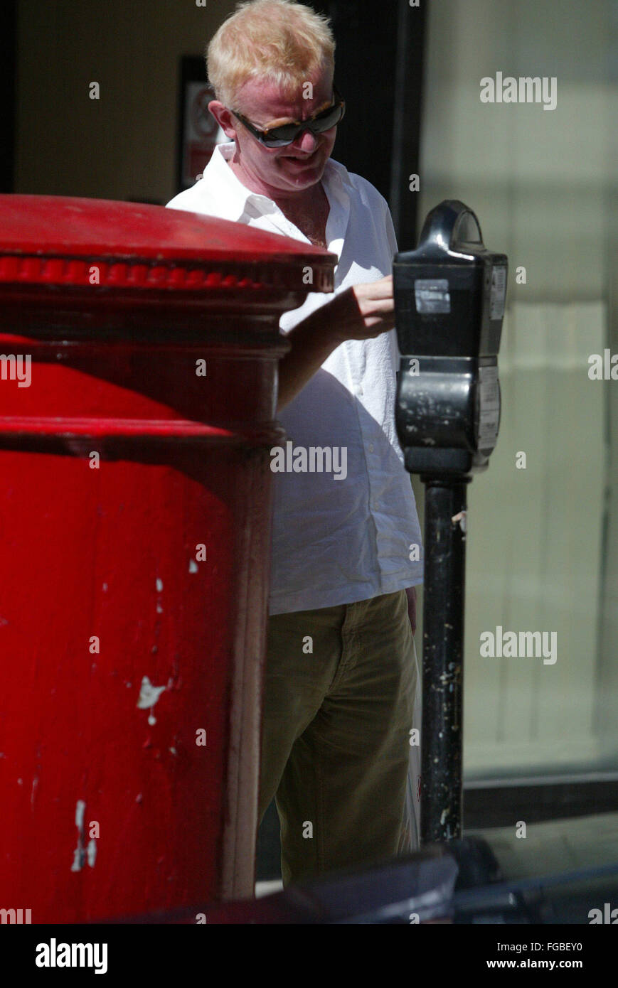 Chris Evans feeds the parking meter in London, (credit image © Jack ...