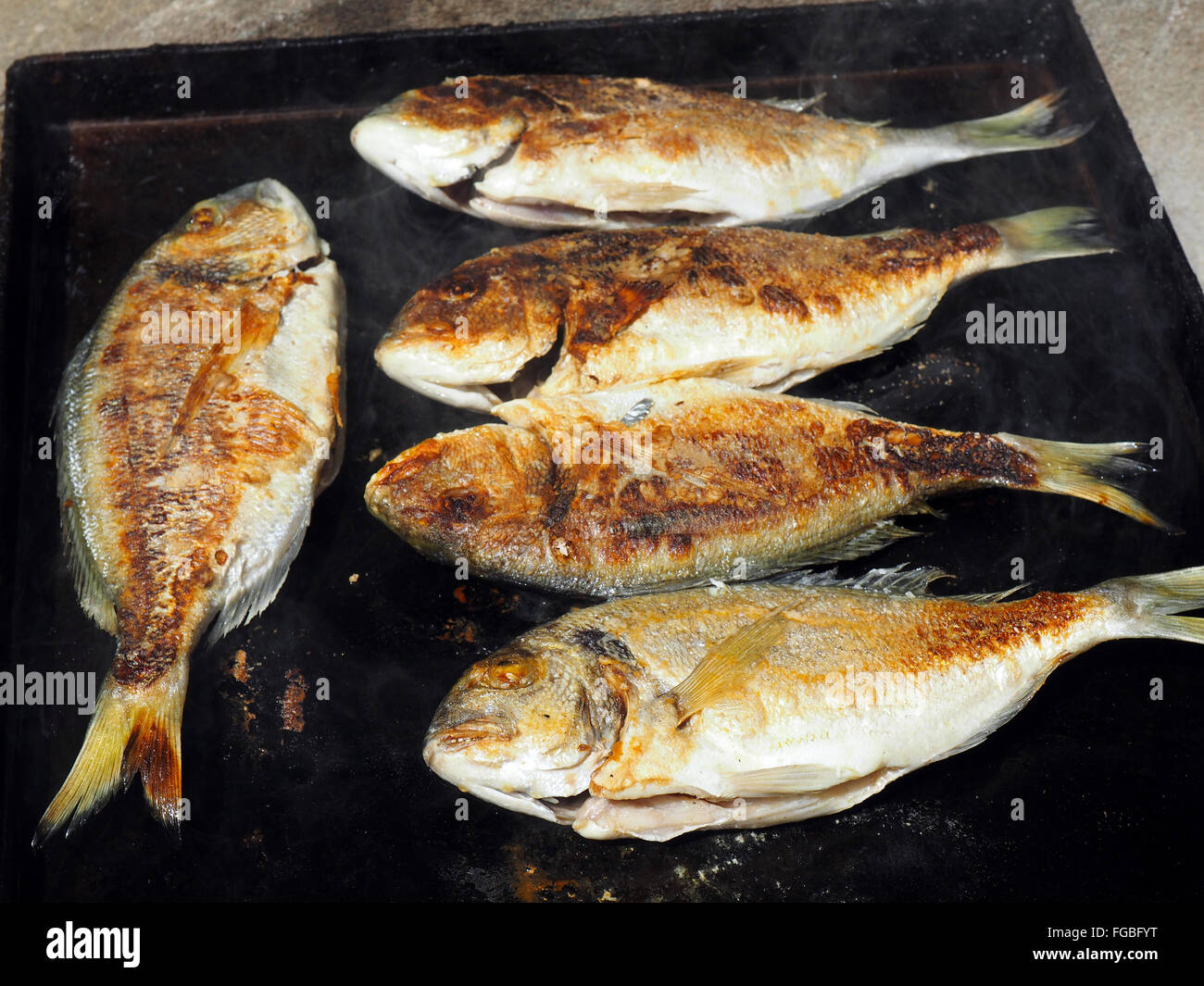 Fresh grilled sea bass barbecue hi-res stock photography and images - Alamy
