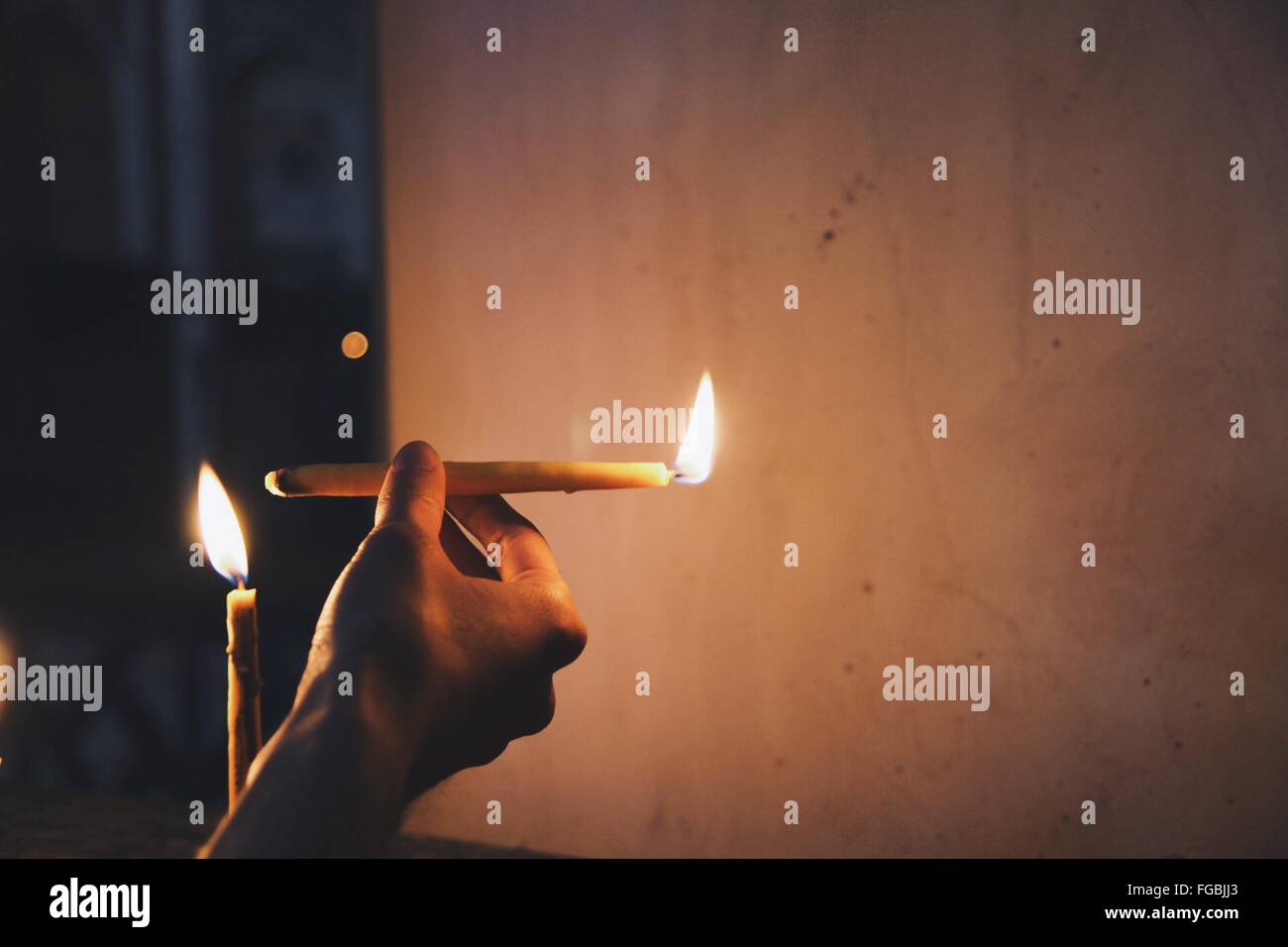 Hand And Flame High Resolution Stock Photography and Images - Alamy