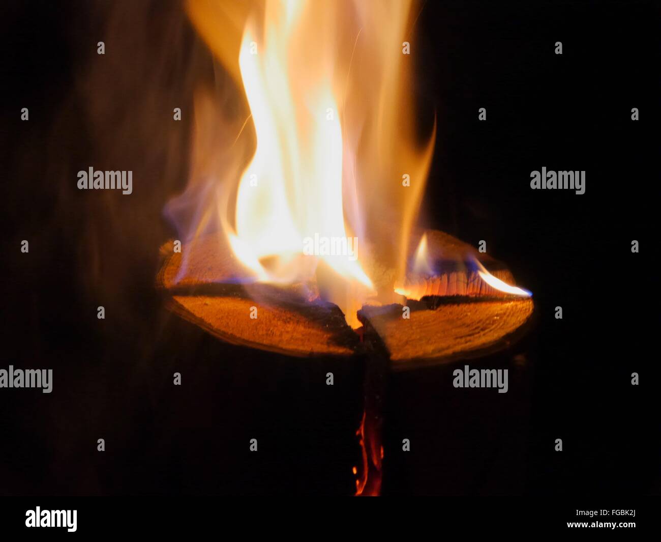 Close-Up Of Tree Stump Burning At Night Stock Photo - Alamy