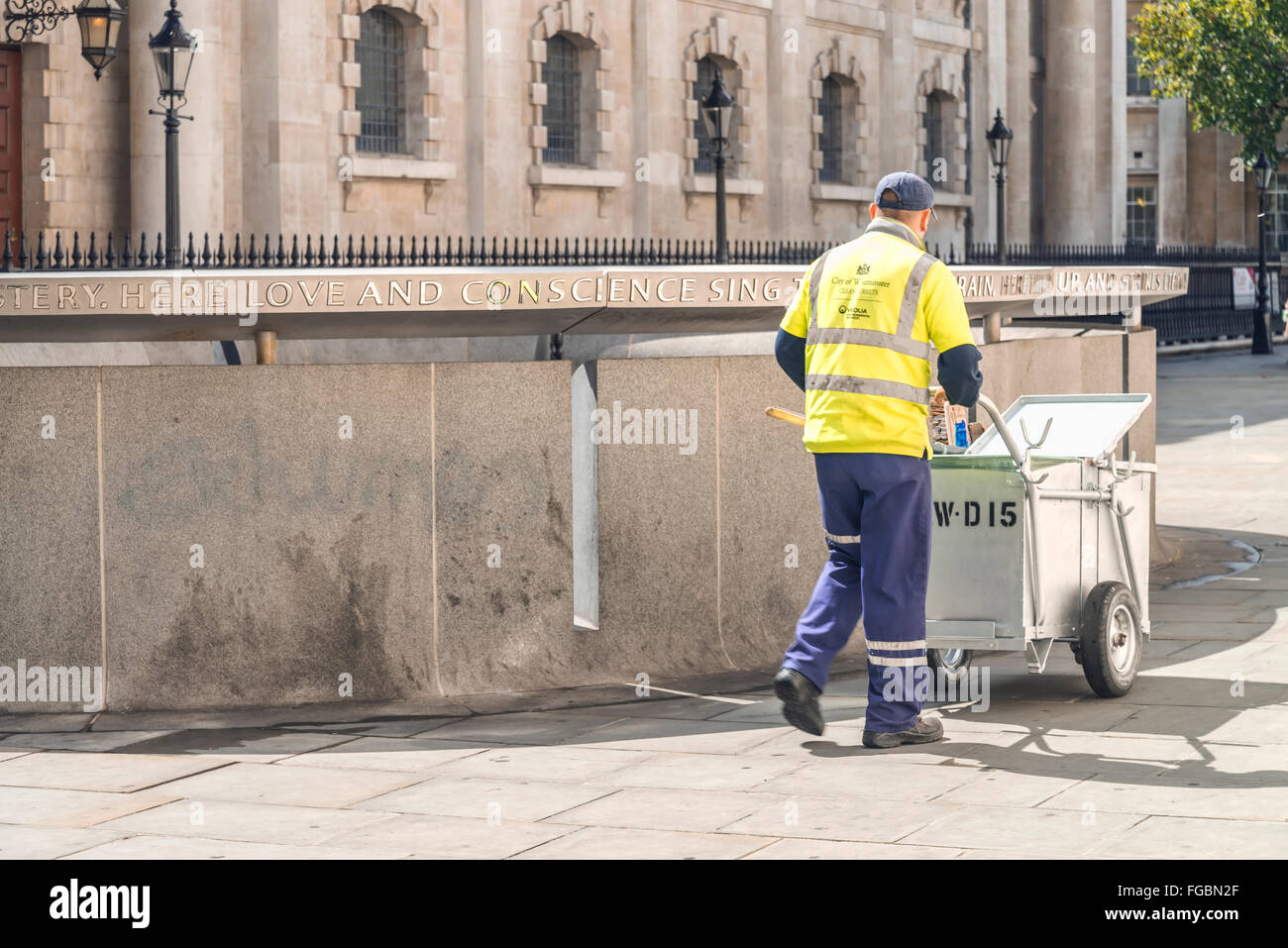 Street cleaner working in London city Stock Photo - Alamy