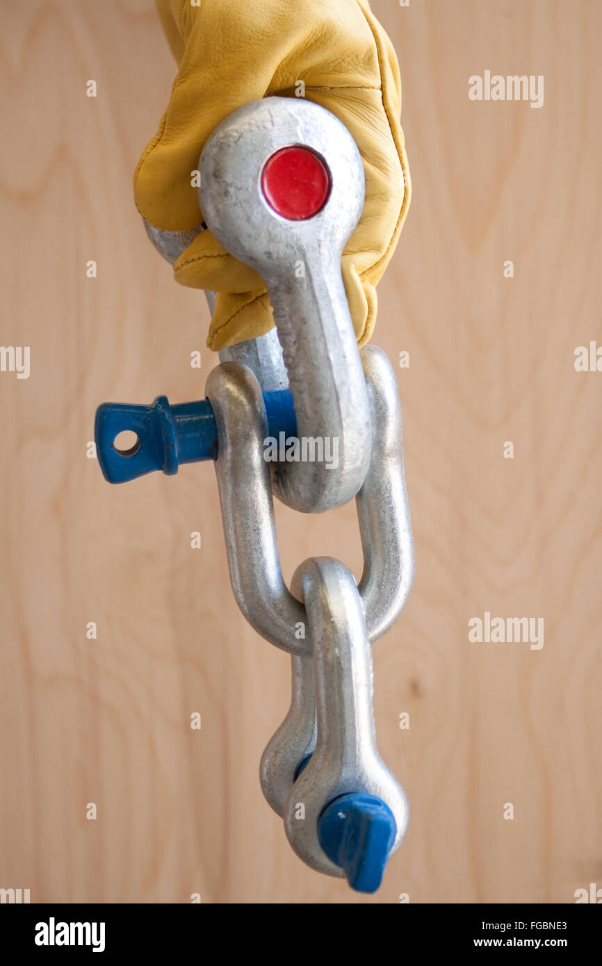 Handling , textile sling Stock Photo - Alamy