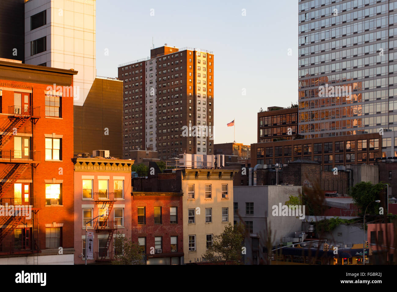 Buildings In City During Sunset Stock Photo - Alamy