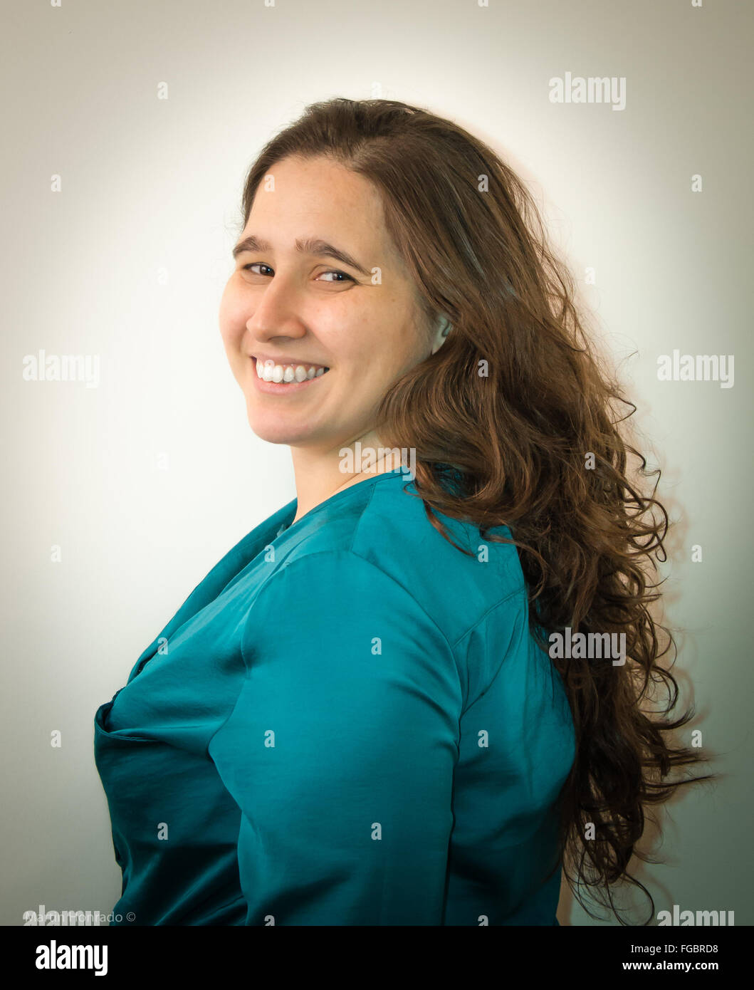 Woman looking over shoulder hair hi-res stock photography and images ...