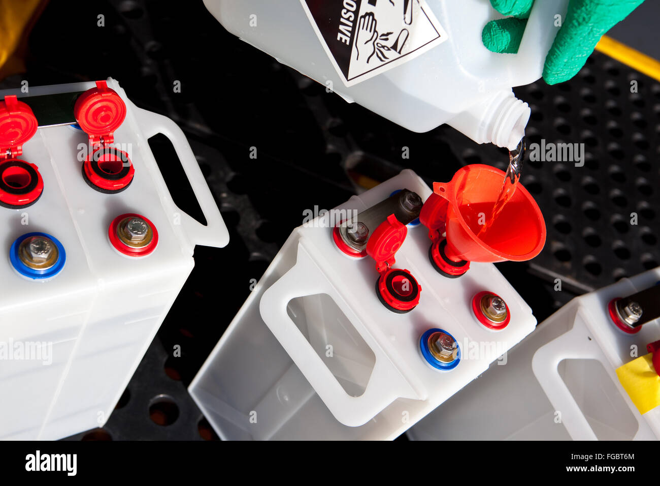 New batteries preparation and installation Stock Photo - Alamy