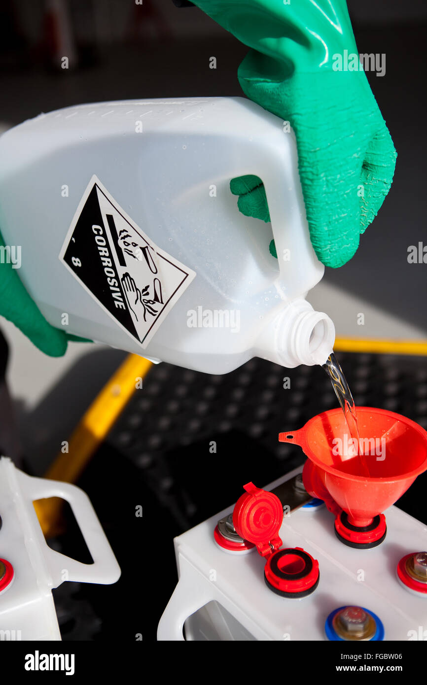 New batteries preparation and installation Stock Photo - Alamy