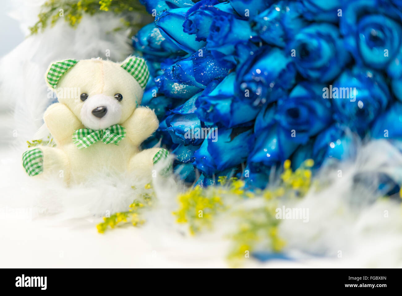 Teddy Bear With Blue Roses