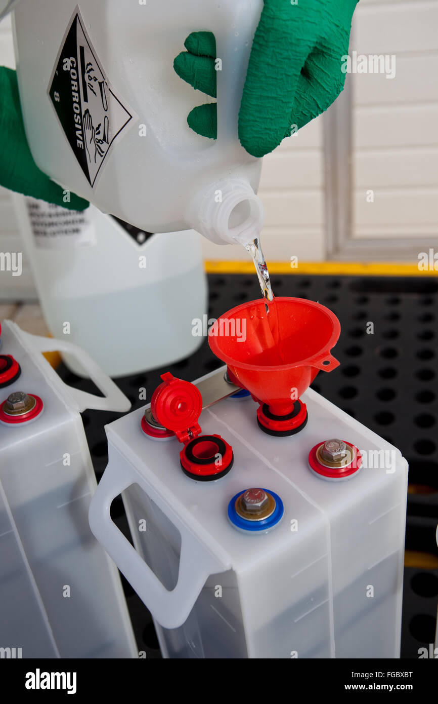 New batteries preparation and installation Stock Photo - Alamy