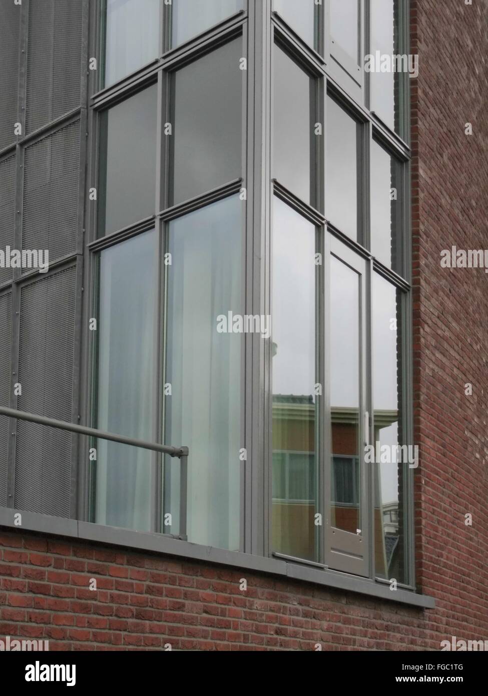 Reflection On Glass Window Of Building Stock Photo - Alamy