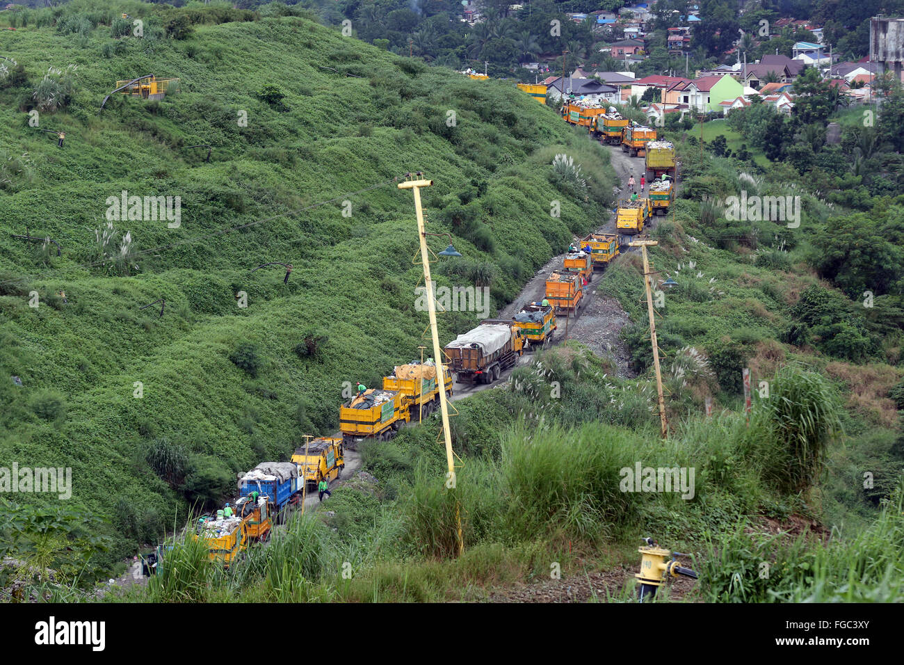 Garbage trucks are lining at Payatas garbage landfill, dump site Quezon ...