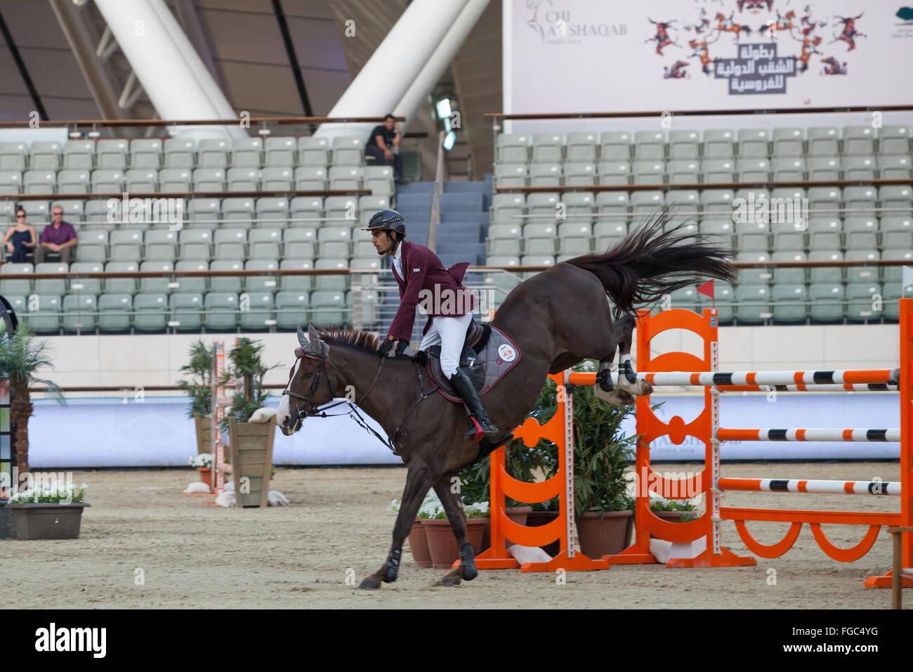 Qatari rider competing in Show Jumping competition at CHI Al Shaqab ...