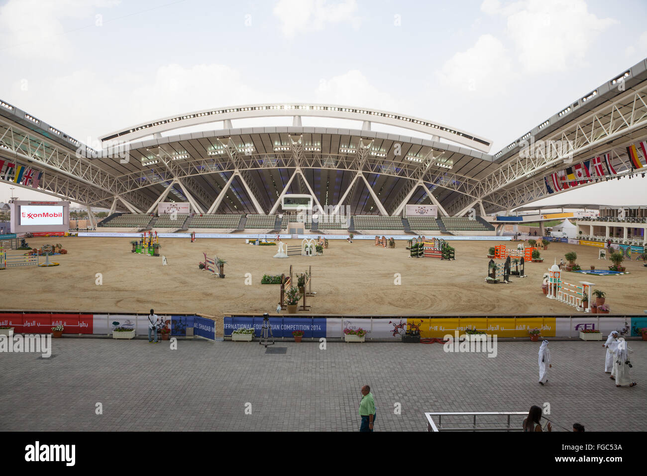 Preparations for show jumping in outdoor arena at CHI Al Shaqab 2014 ...